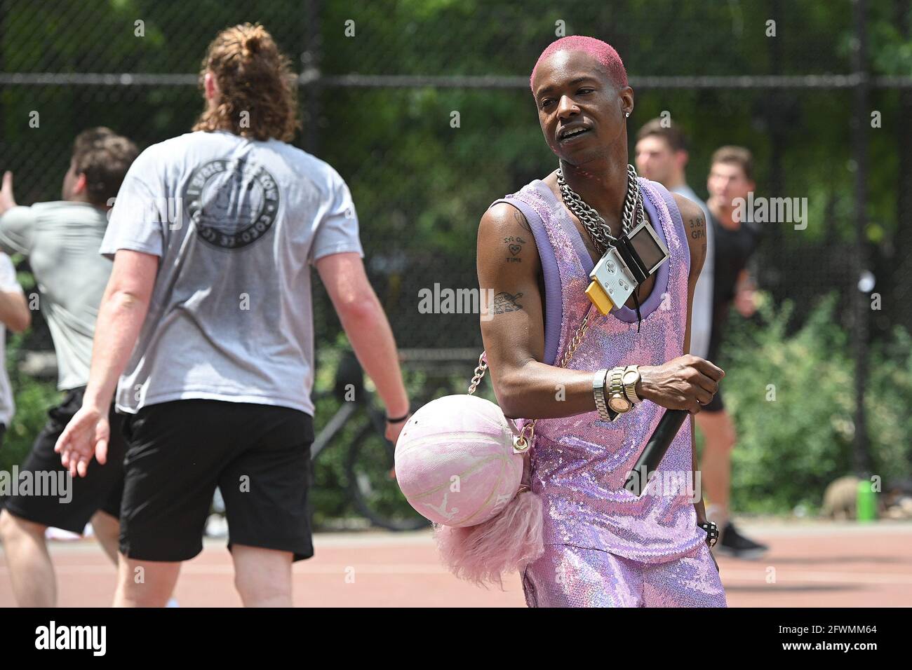 Mayoral candidate Paperboy Prince performs a song before playing a ...