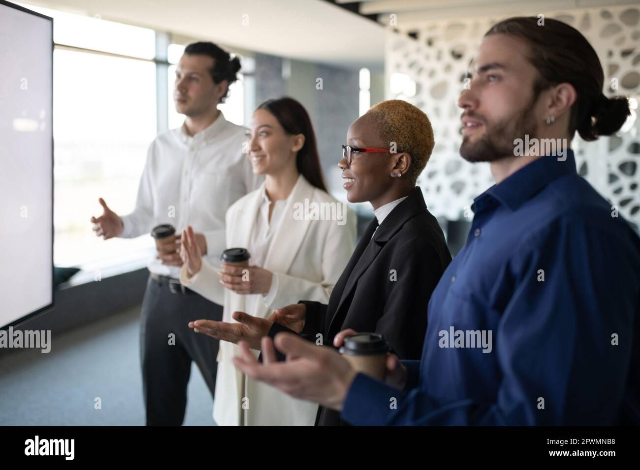 Positive diverse team having online meeting Stock Photo - Alamy