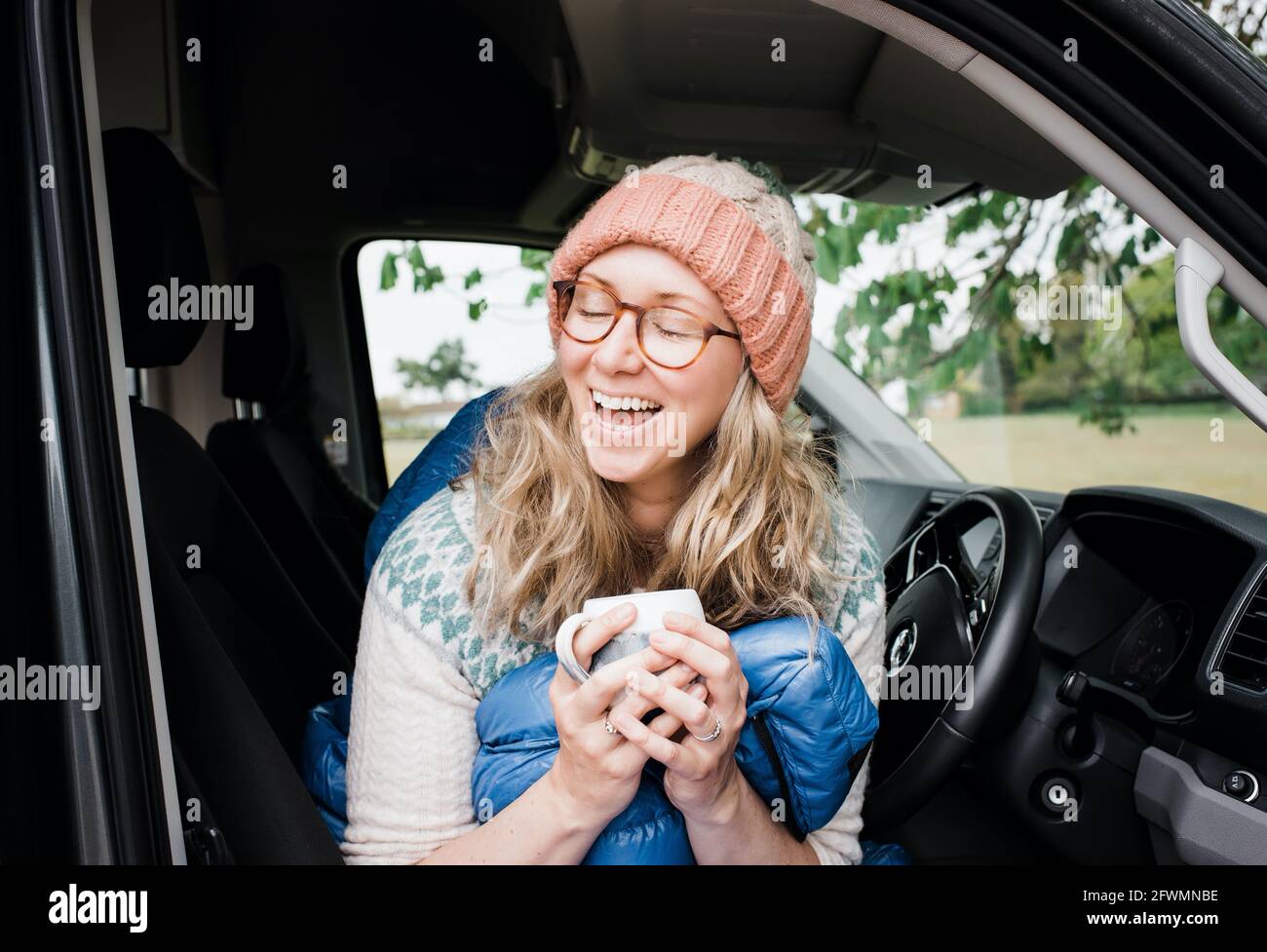 Beautiful woman in camper van hi-res stock photography and images - Alamy