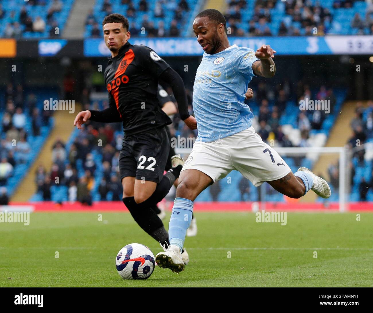 Manchester, England, 23rd May 2021. Ben Godfrey of Everton challenges ...