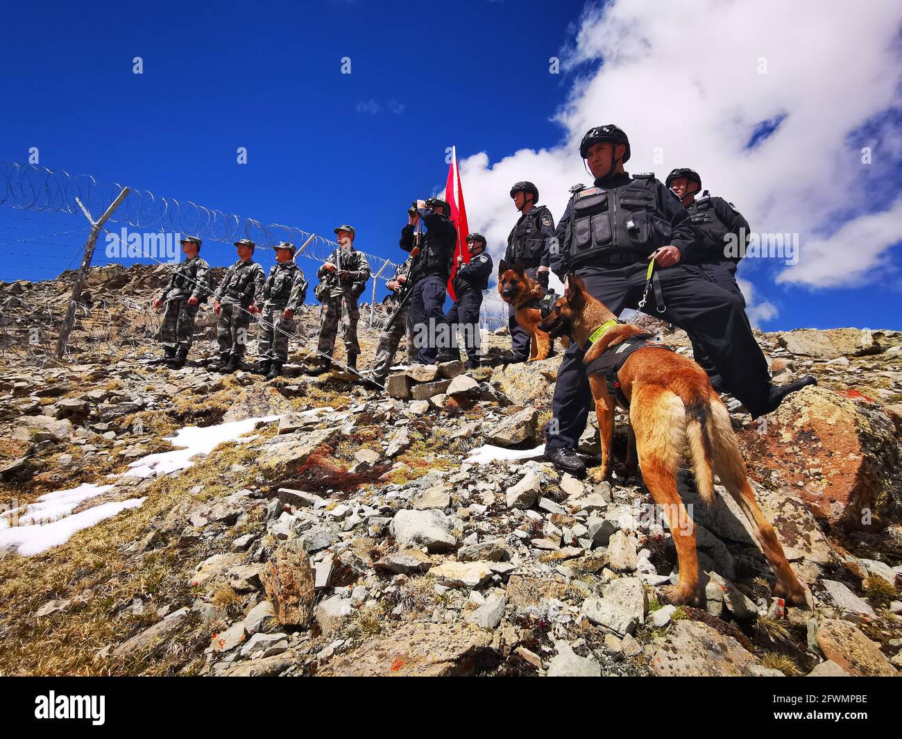 ALTAY, CHINA - MAY 23, 2021 - Police officers patrol the border with ...