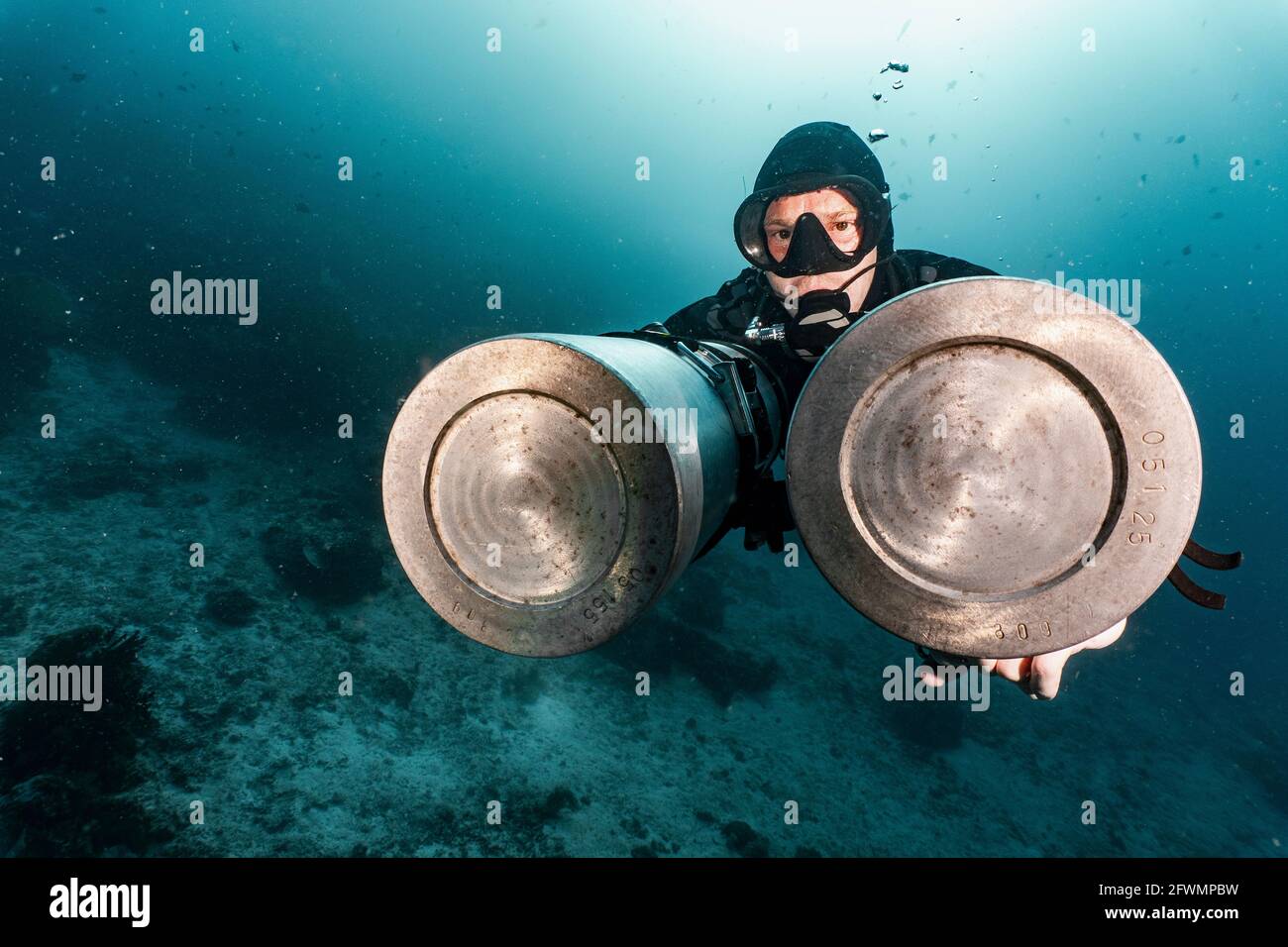 tech diver with side mounted air tanks in Raja Ampat / Indonesia Stock ...