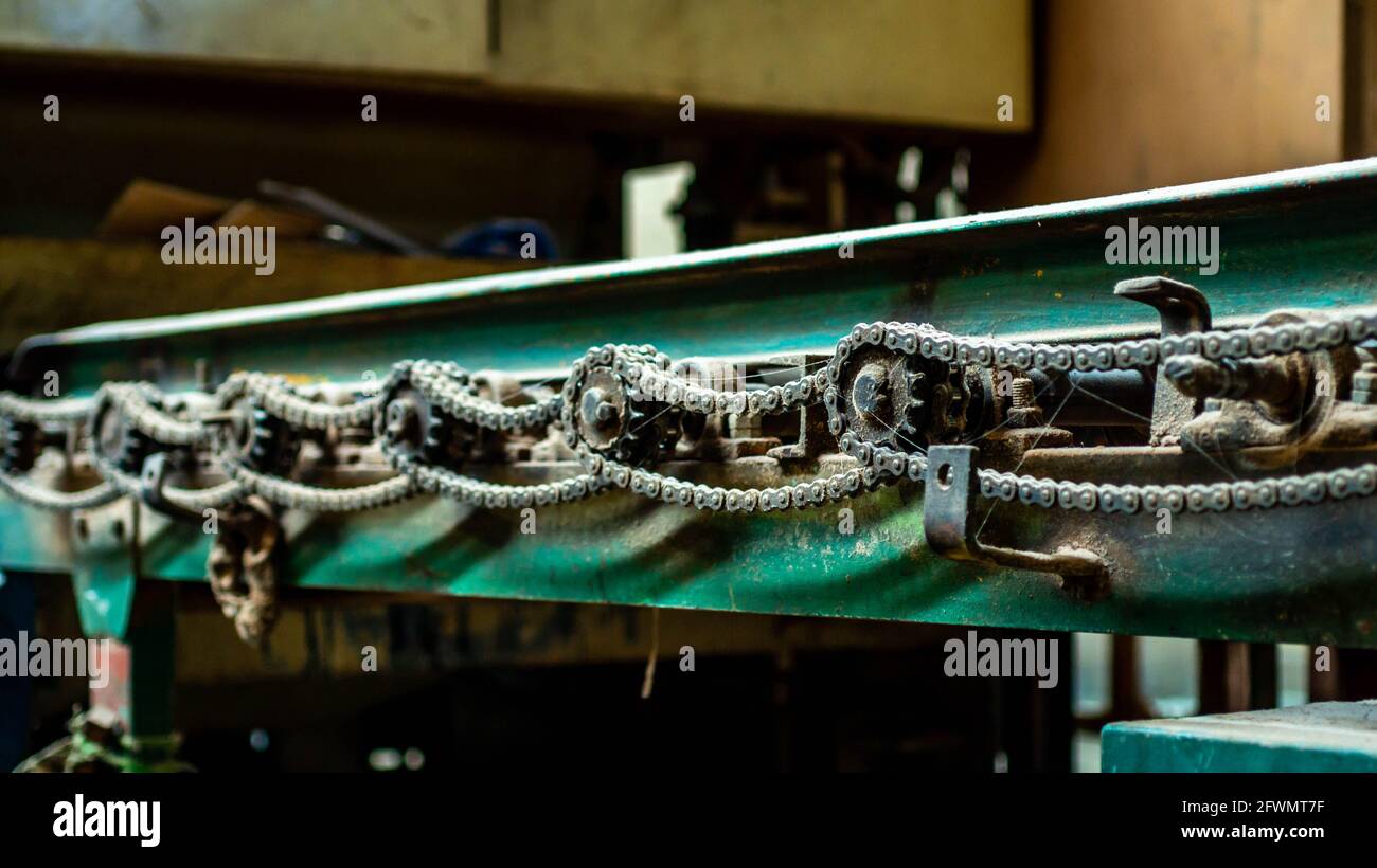 chains connected one to another as part of machine. industrial ...