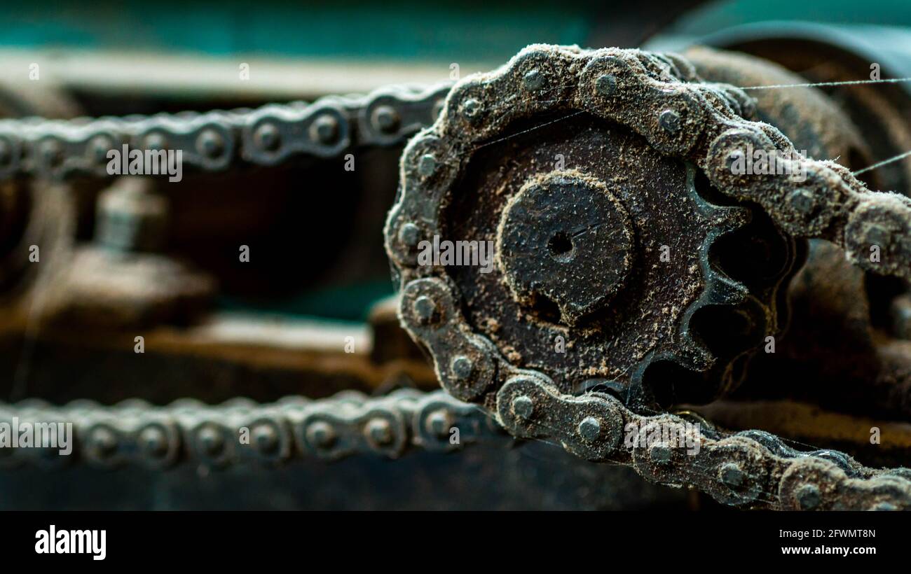 chains connected one to another as part of machine. industrial ...