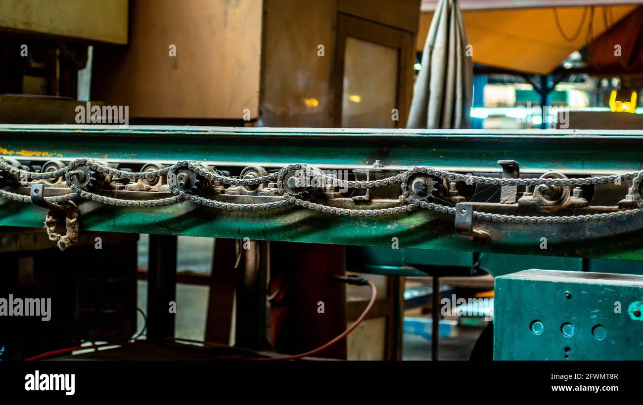 chains connected one to another as part of machine. industrial ...