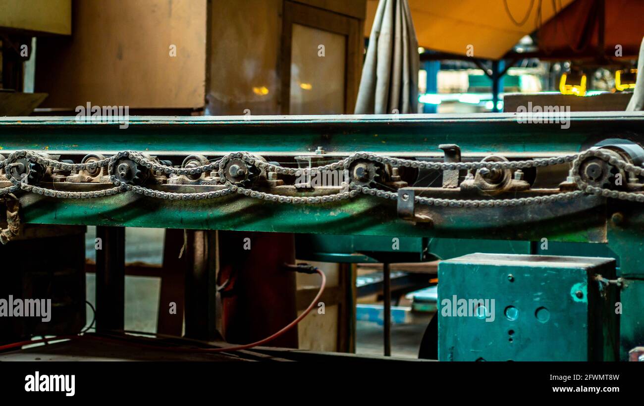 chains connected one to another as part of machine. industrial ...