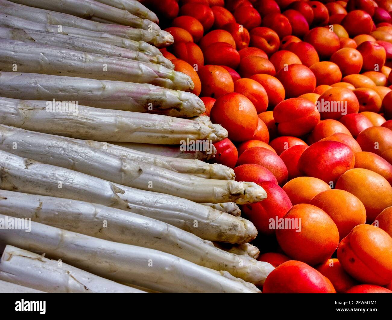 Asparagus and Tomatoes on display at market stall in Les halls, Paris ...