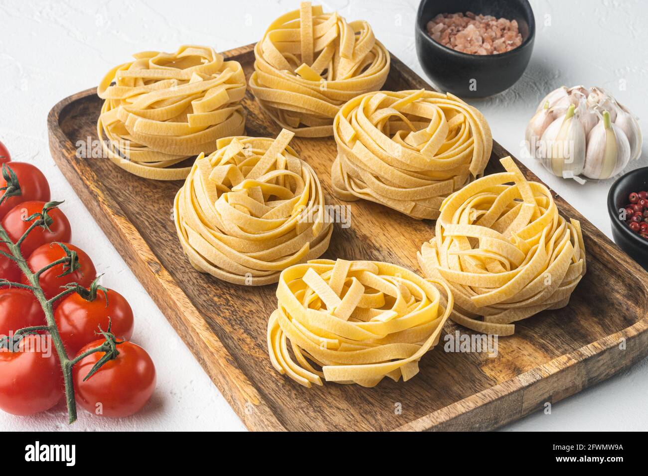 Fettuccine Tagliatelle pasta Italian food ingredients set, on white ...