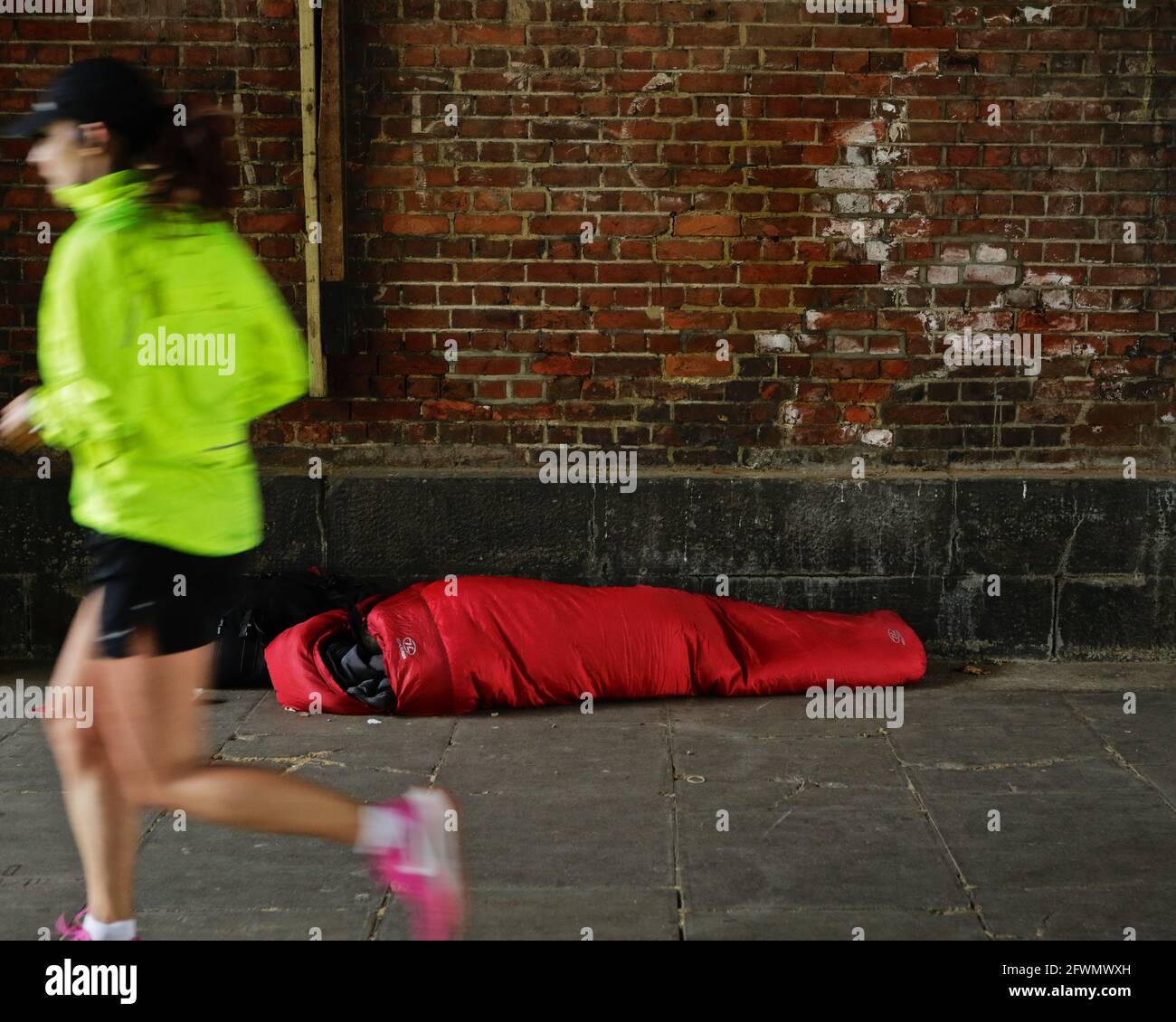 Homeless Woman Sleeping On Street High Resolution Stock Photography and ...