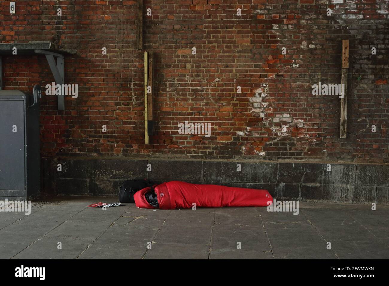 London (UK), 23 May 2021: A homeless person is seen under a bridge ...