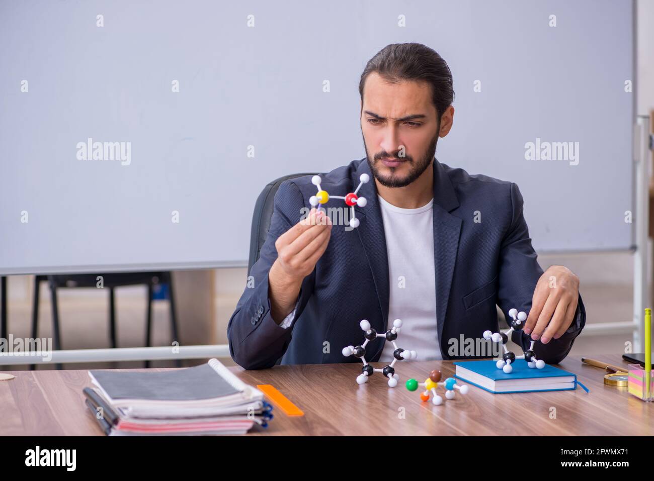 Young teacher physicist in hi-res stock photography and images - Alamy