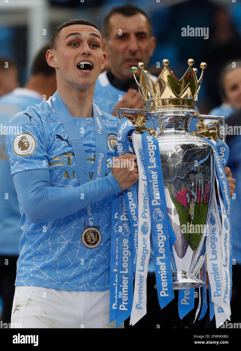 Manchester, England, 23rd May 2021. Phil Foden of Manchester City holds ...
