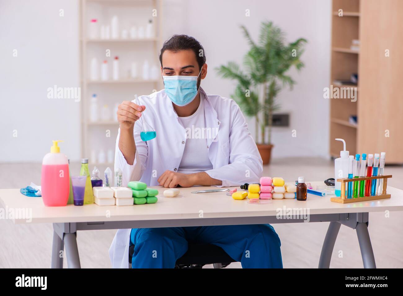 Young chemist testing soap in the lab Stock Photo - Alamy