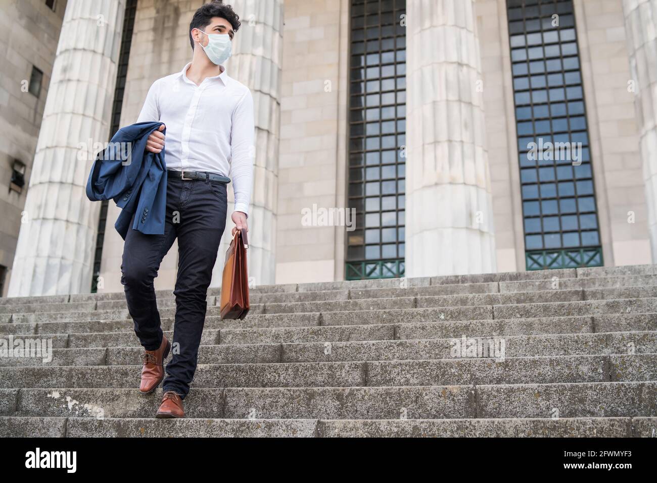 Businessman on his way to work Stock Photo - Alamy