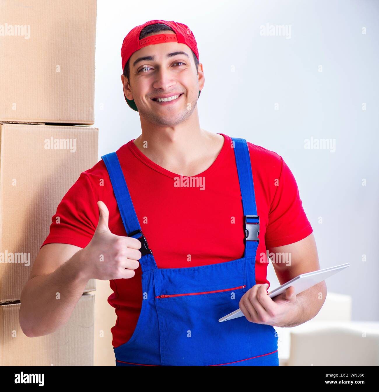 The contractor worker moving boxes during office move Stock Photo - Alamy