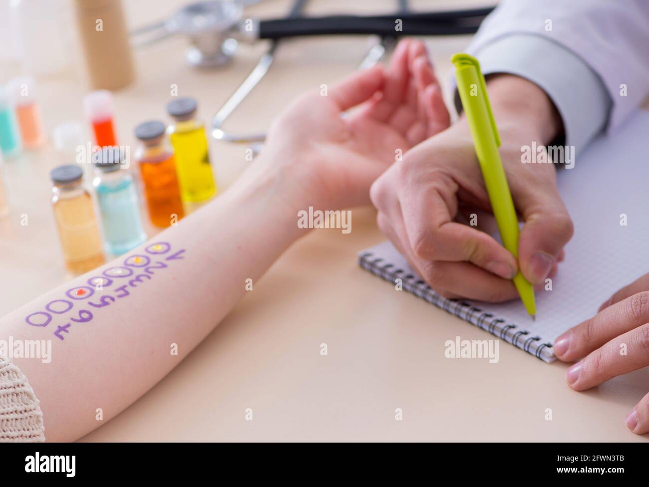 The doctor testing allergy reaction of patient in hospital Stock Photo ...