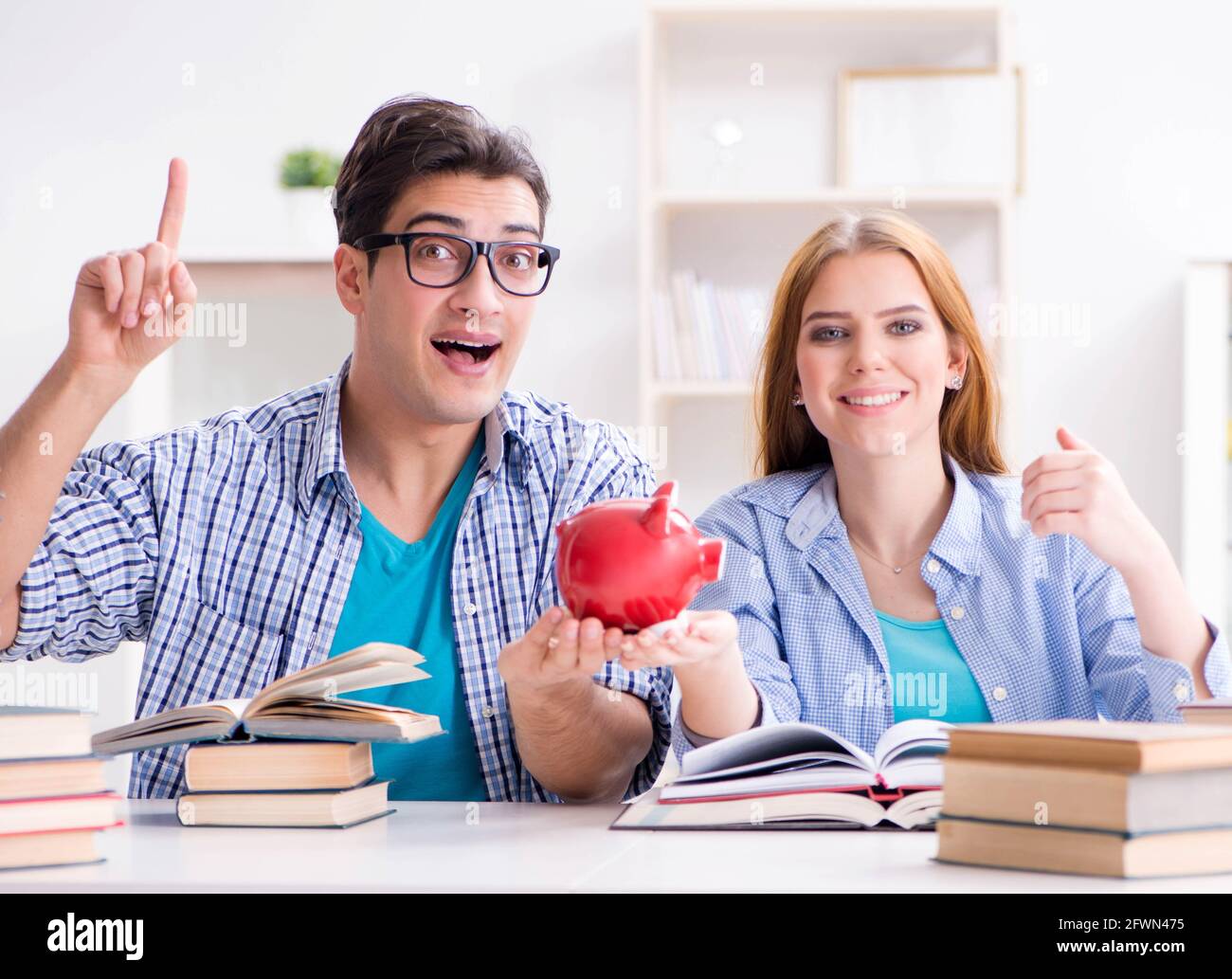 The two students checking savings to pay for education Stock Photo - Alamy