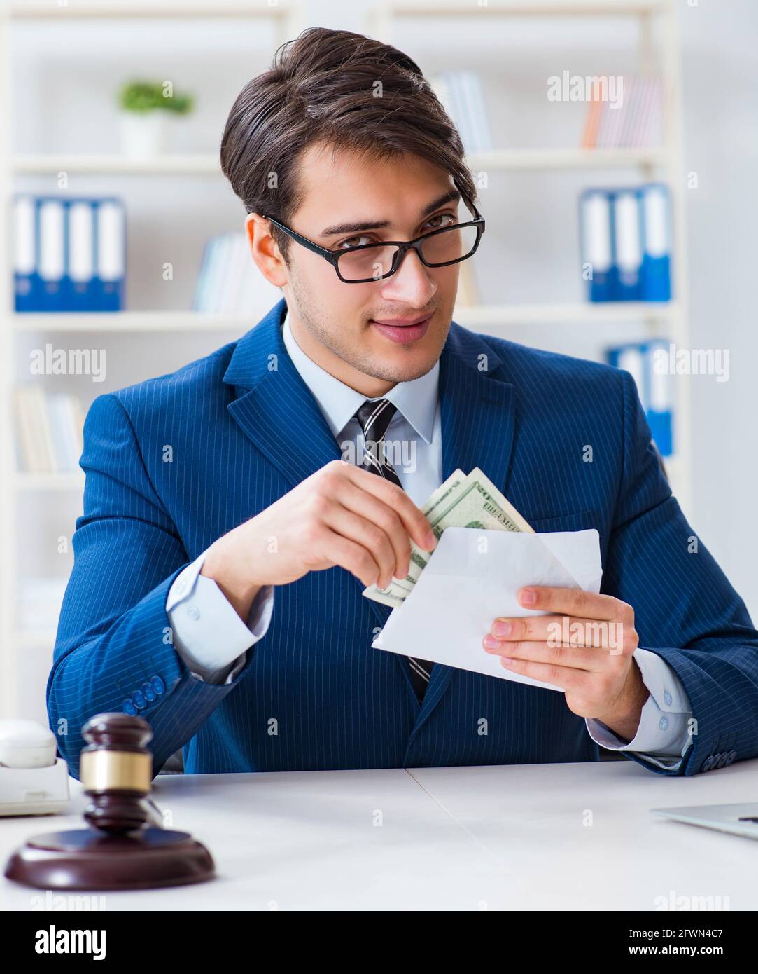 Lawyer receiving money as bribe hi-res stock photography and images - Alamy