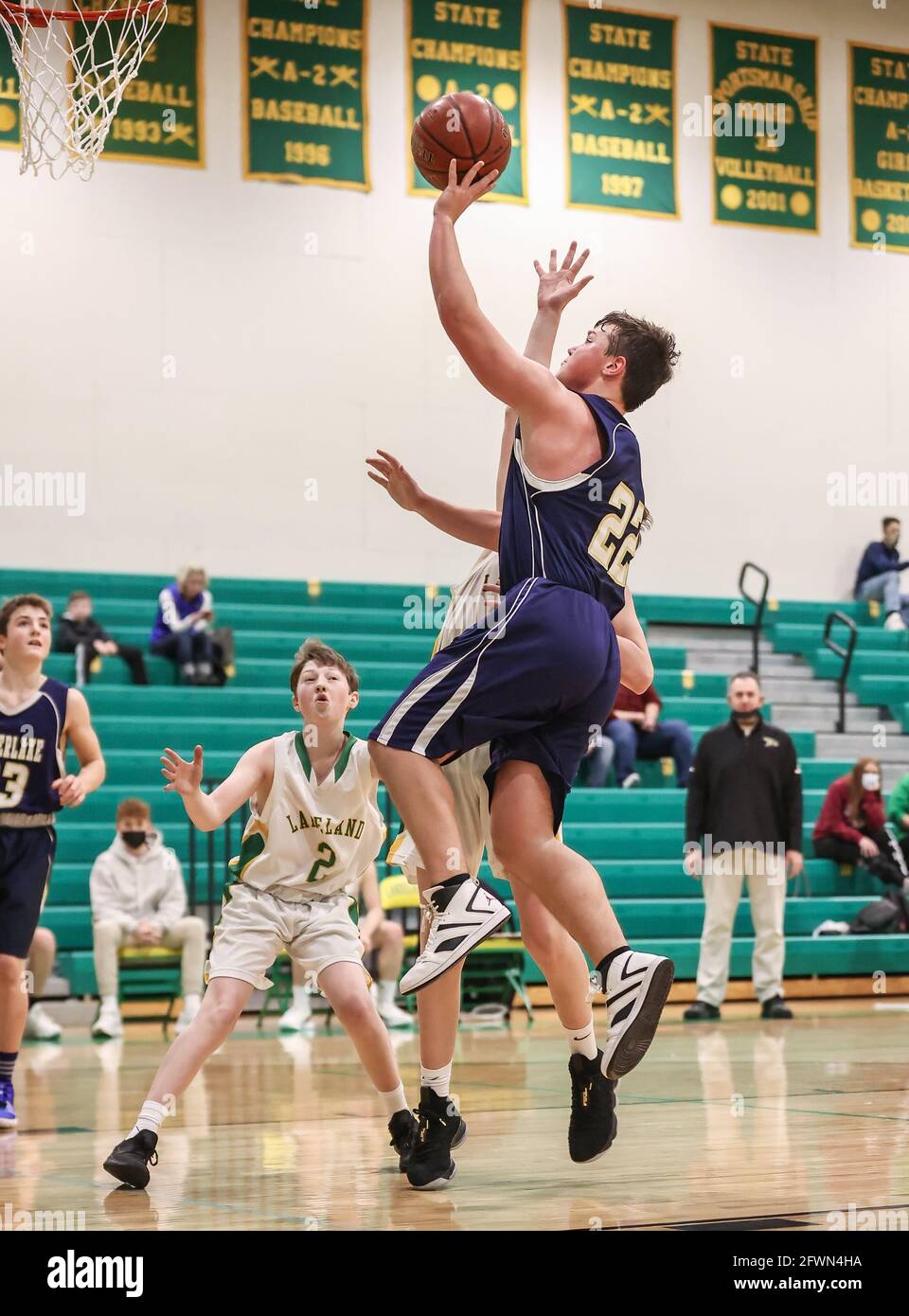 Basketball action with Timberlake vs Lakeland High School in Rathdrum ...
