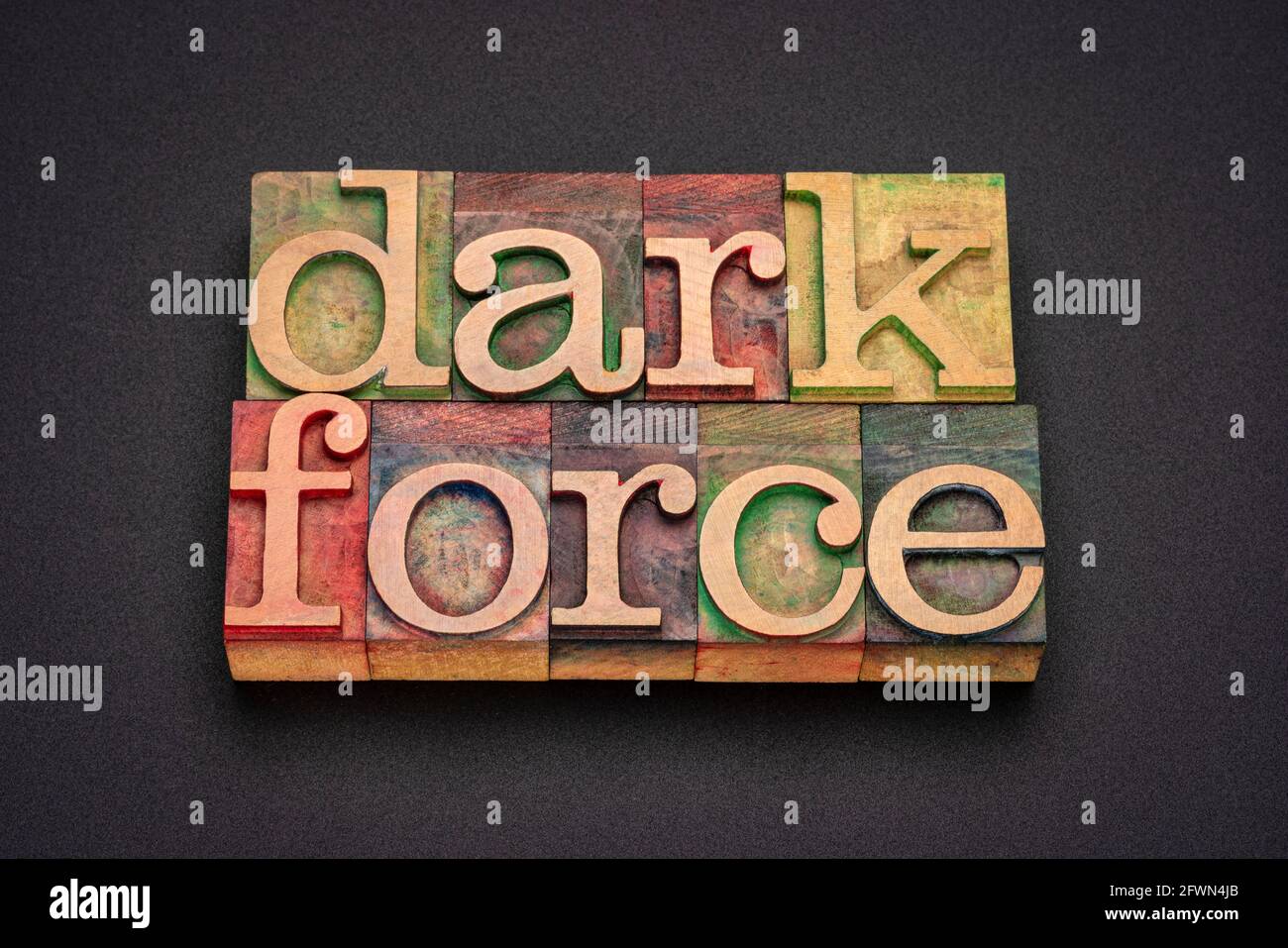 dark force - word abstract in vintage letterpress wood type against ...