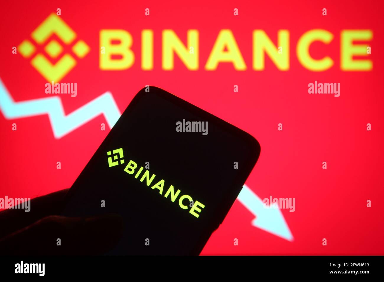 In this photo illustration a Binance logo of a cryptocurrency exchange ...