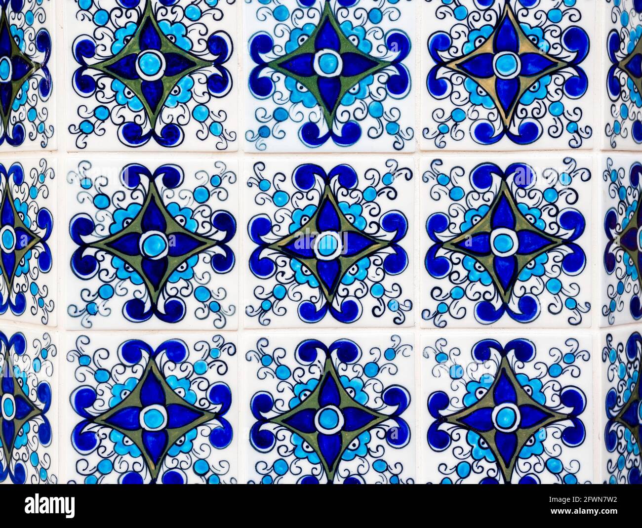 Blue mosaic tiles wall background Moroccan style. Vintage traditional ...