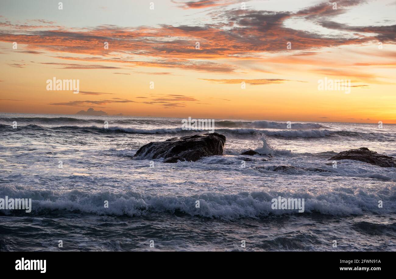 Colorful beach sunset clouds hi-res stock photography and images - Alamy