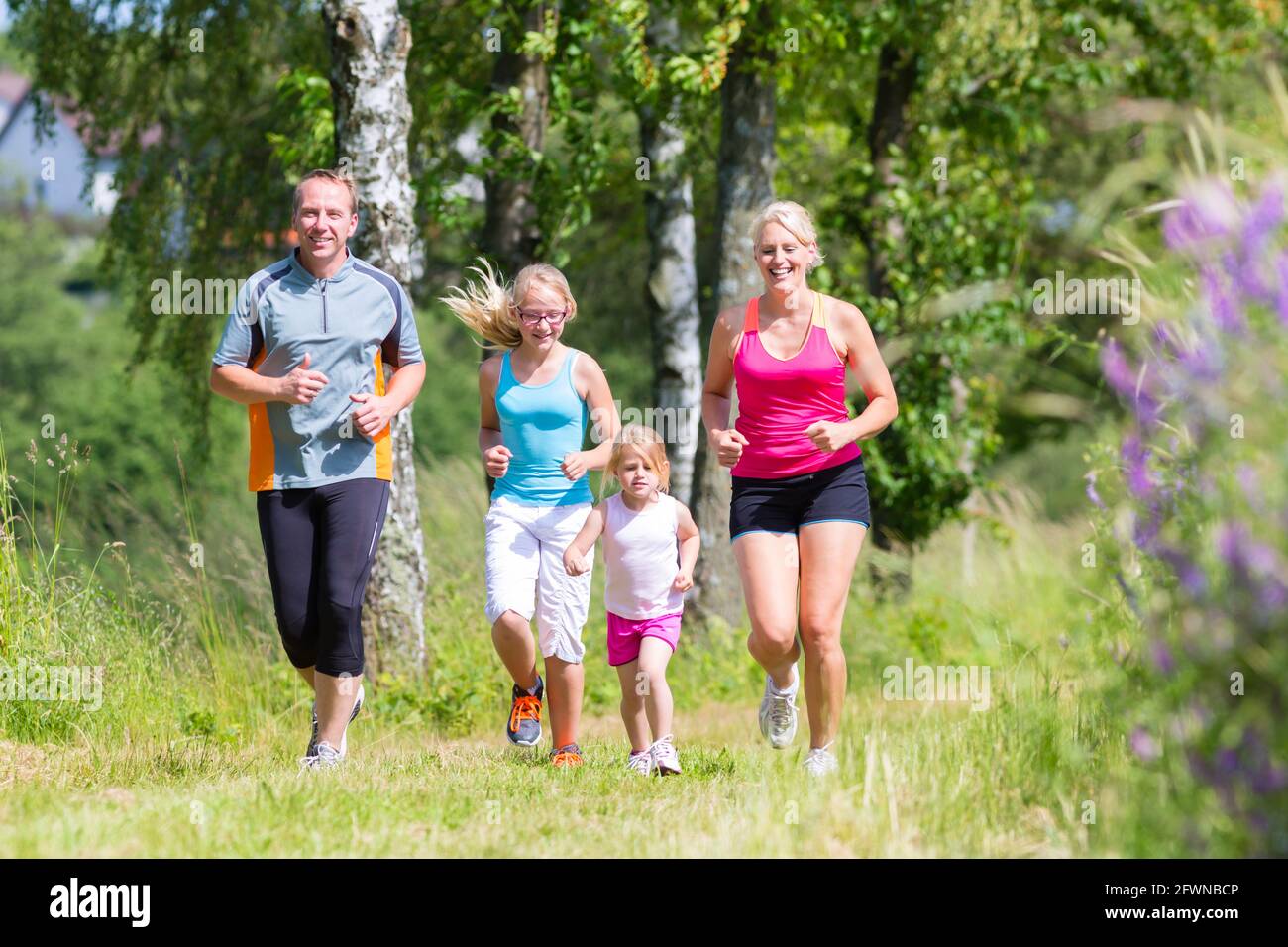 Children running forest hi-res stock photography and images - Alamy