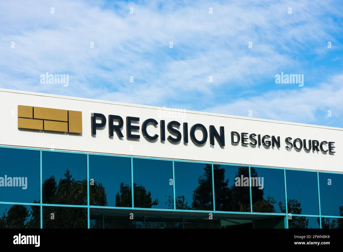Precision Design Source sign on a luxury turnkey design studio office ...