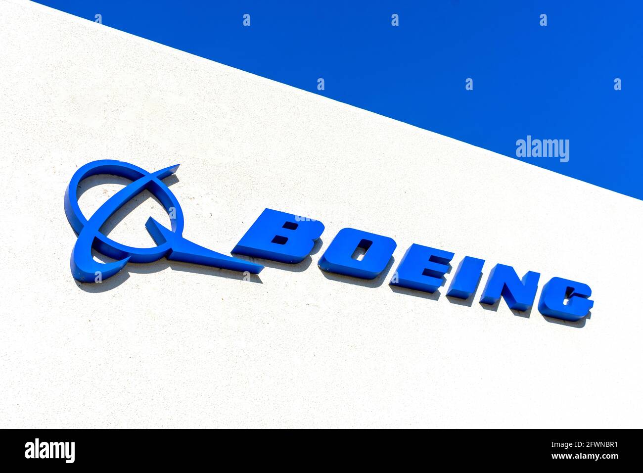 Boeing logo, sign on company office. The Boeing Company is an American ...