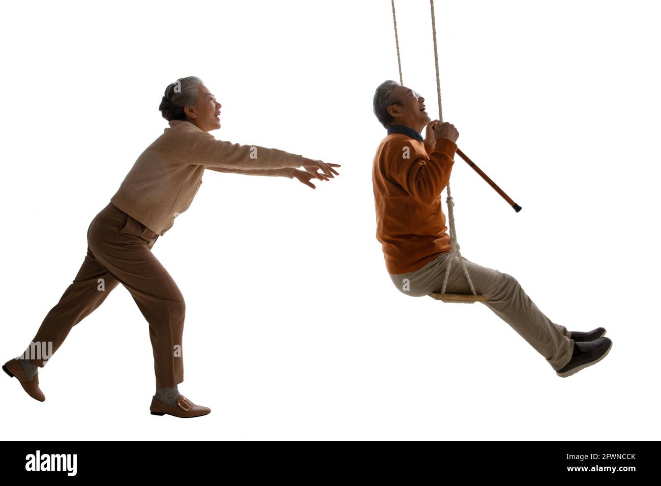 Old couple on swing hi-res stock photography and images - Alamy