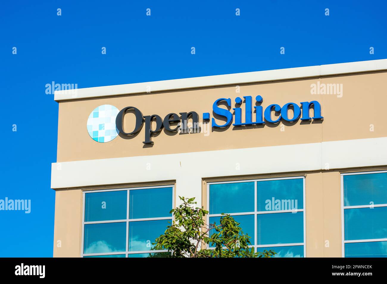 Open Silicon sign logo on headquarters building facade. Open-Silicon, a ...
