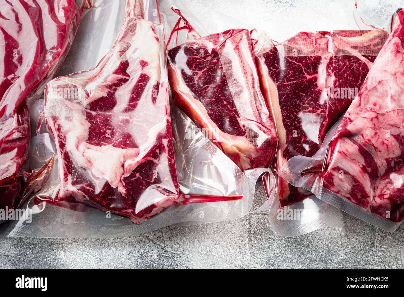 Beef steak vacuum sealed ready for sous vide cooking set, tomahawk, t ...