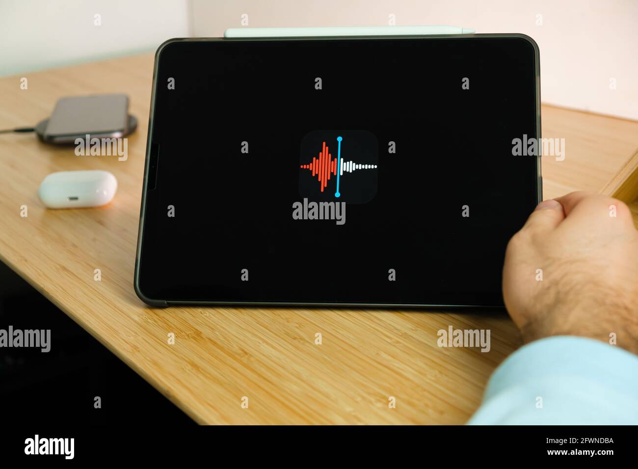 Apple ‎Voice Recorder logo on the screen of iPad tablet. March 2021 ...