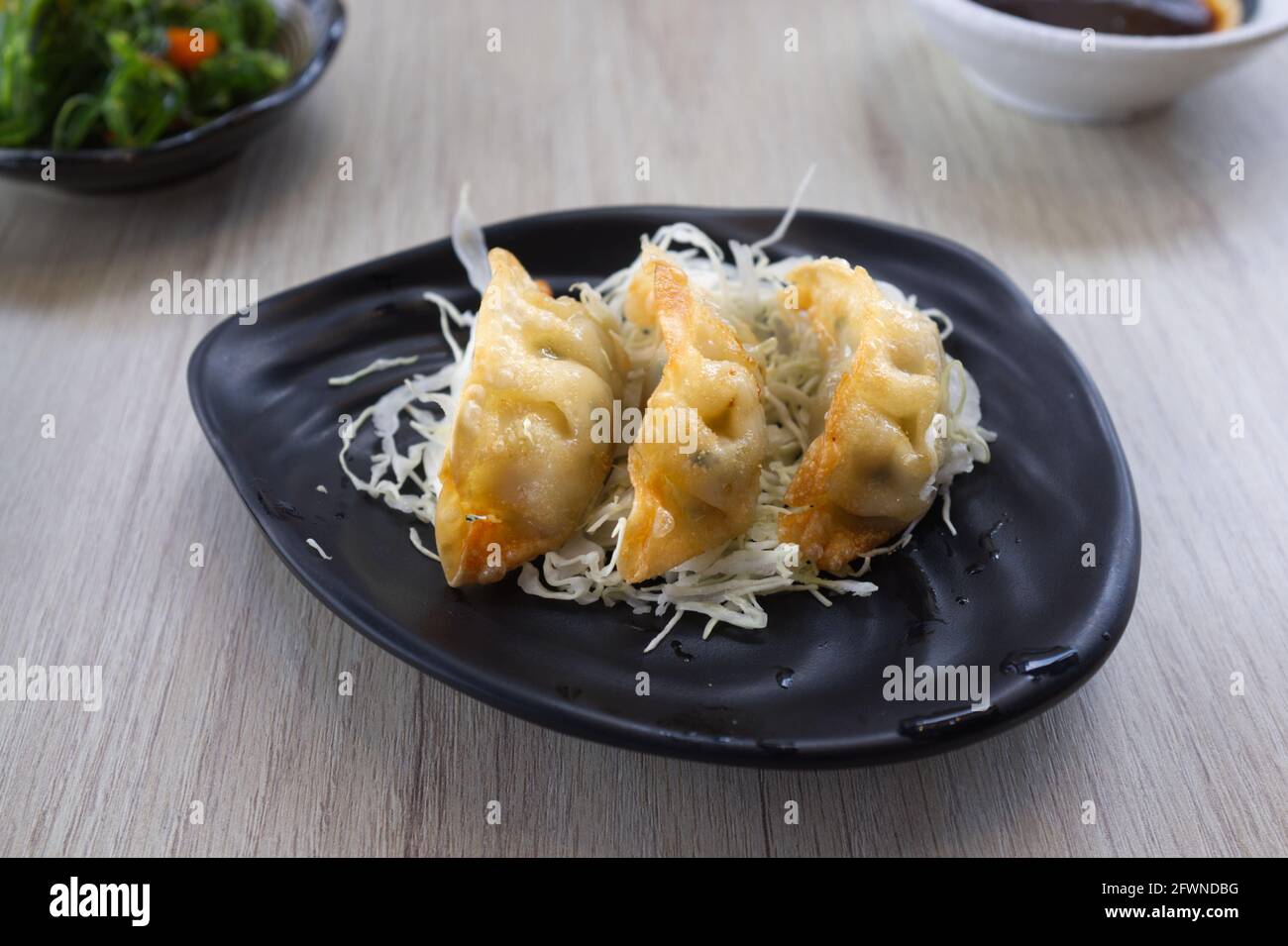 Pan fried meat dumplings hi-res stock photography and images - Alamy