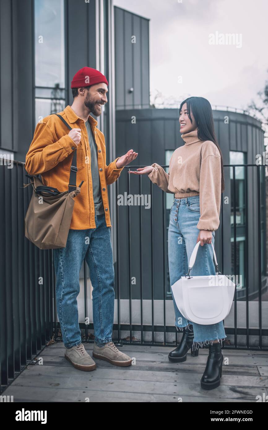 Young caucasian woman asian talk hi-res stock photography and images ...