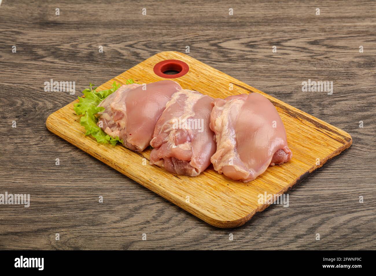 Raw chicken boneless and skinless leg for cooking Stock Photo - Alamy