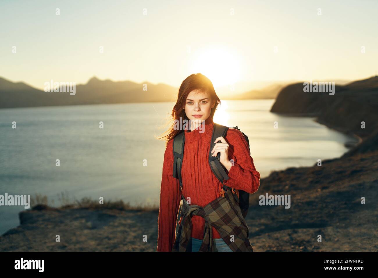 woman tourist walk outdoors landscape sun freedom Stock Photo - Alamy