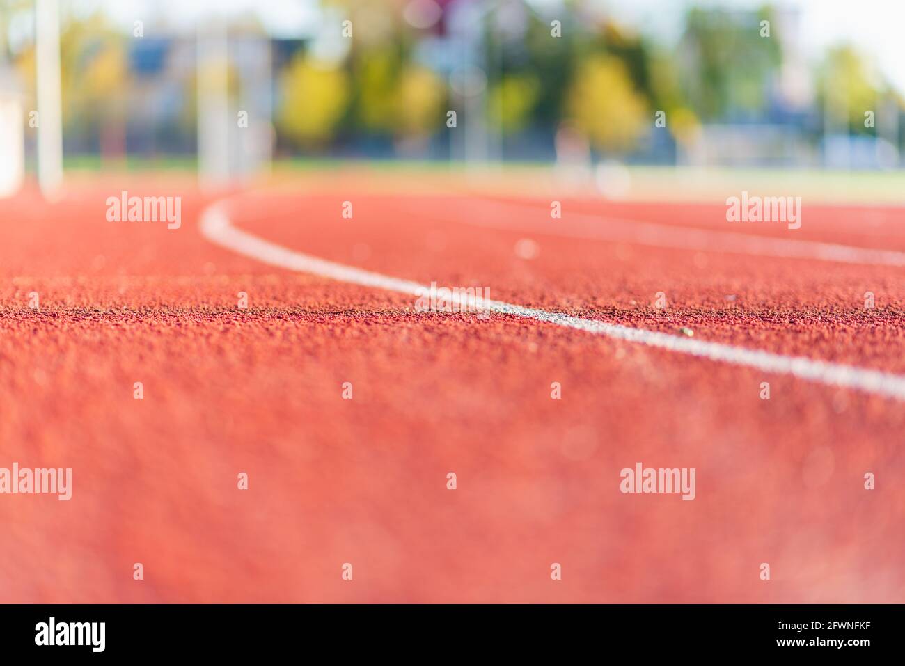 Red plastic track in the outdoor track and field stadium.Closeup Stock ...