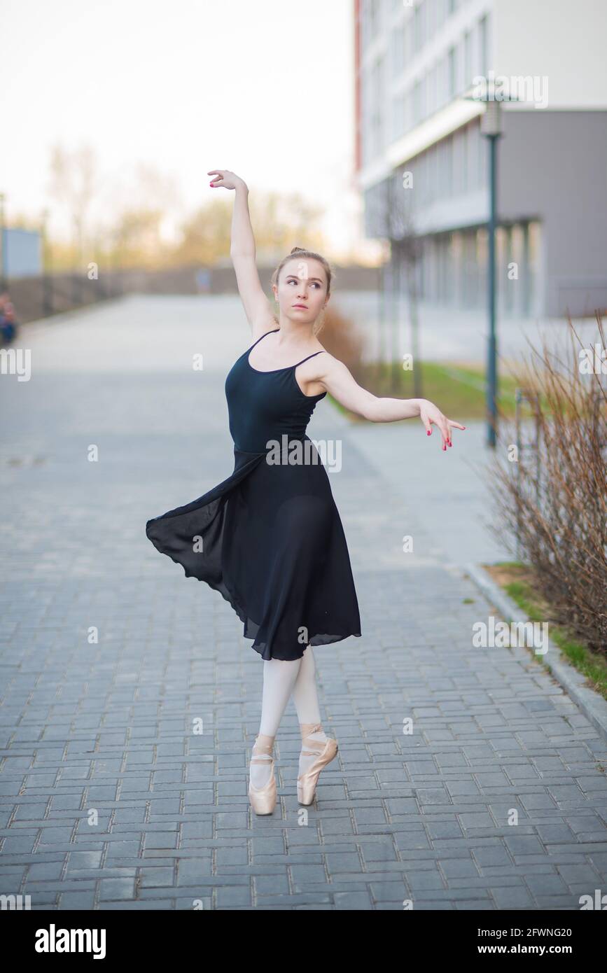 Woman shoes black dress bend hi-res stock photography and images - Alamy
