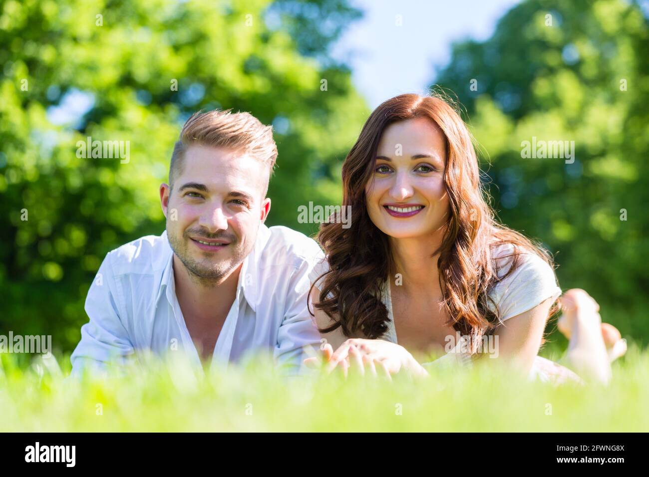 Man sunbath park hi-res stock photography and images - Alamy