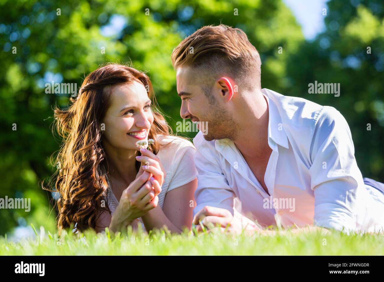 Man sunbath park hi-res stock photography and images - Alamy