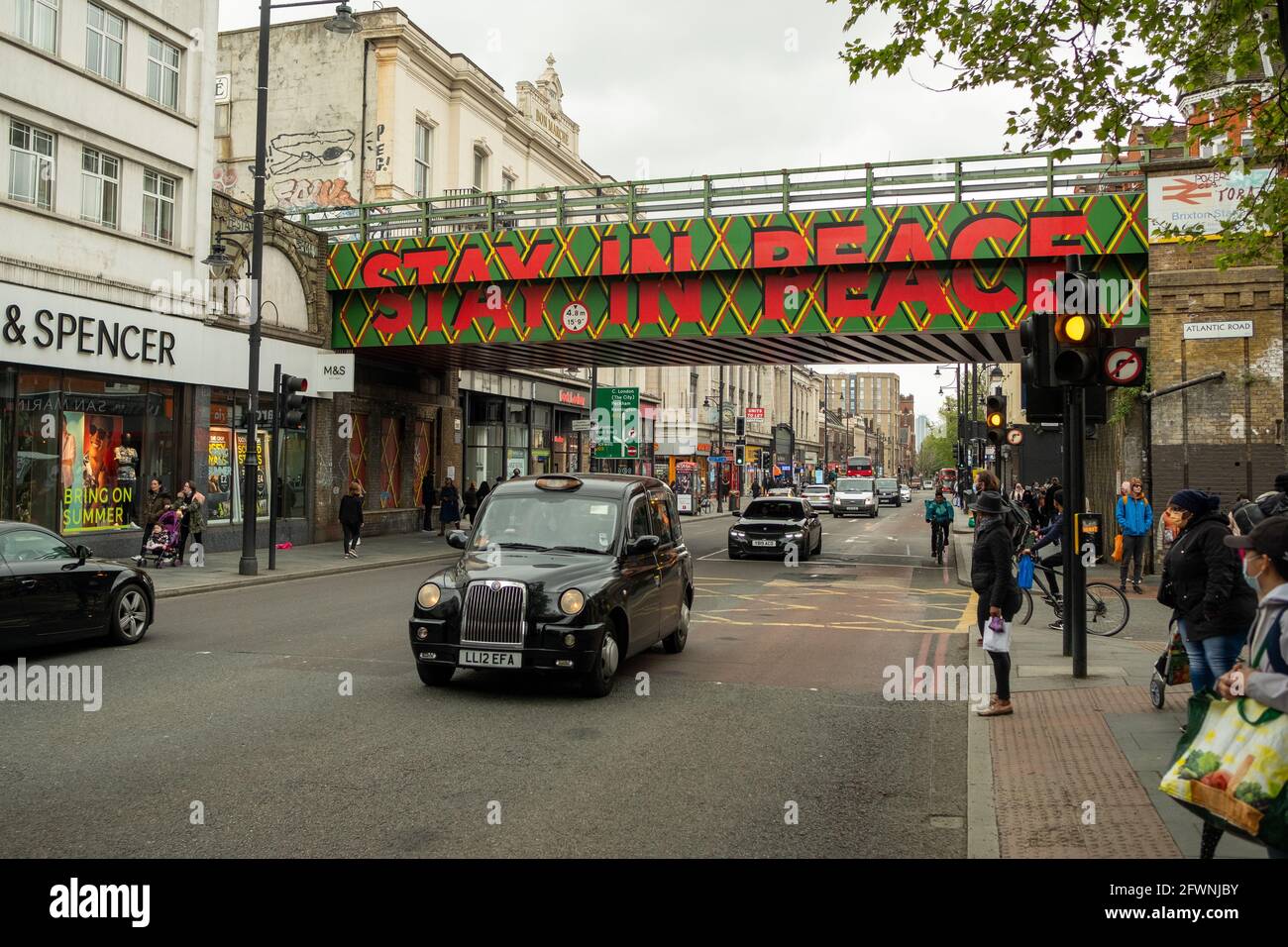 Brixton, London: May 2021: Brixton Road street scene, major high street ...