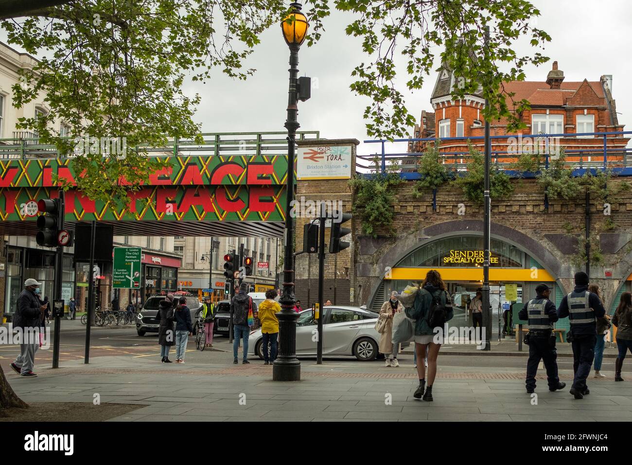 Brixton, London: May 2021: Brixton Road street scene, major high street ...