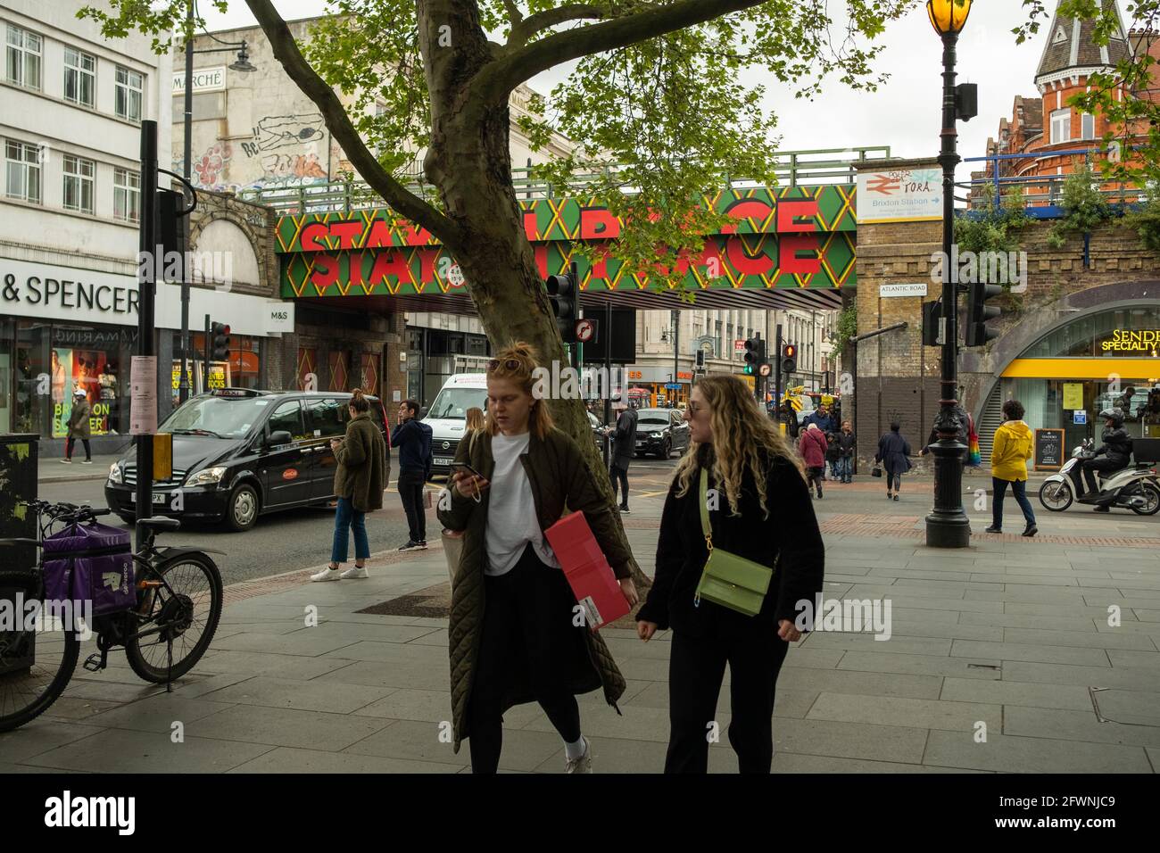 Brixton, London: May 2021: Brixton Road street scene, major high street ...