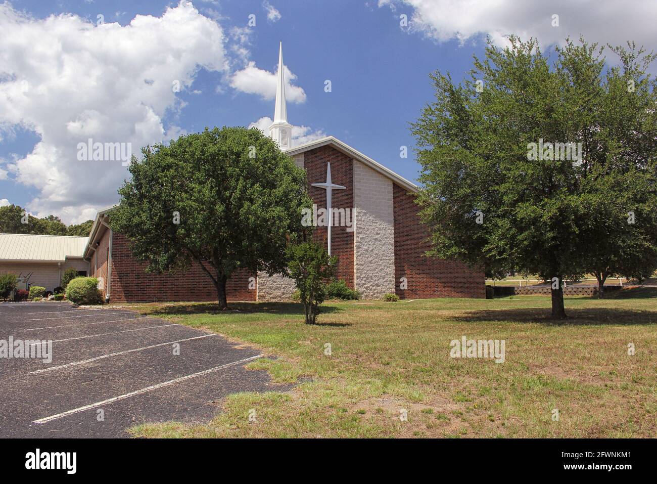 Small Rural Church With Blue Sky with Trees Stock Photo - Alamy
