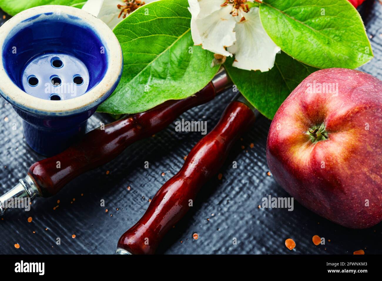 Oriental hookah with the aroma of fresh apples. Floral shisha tobacco ...