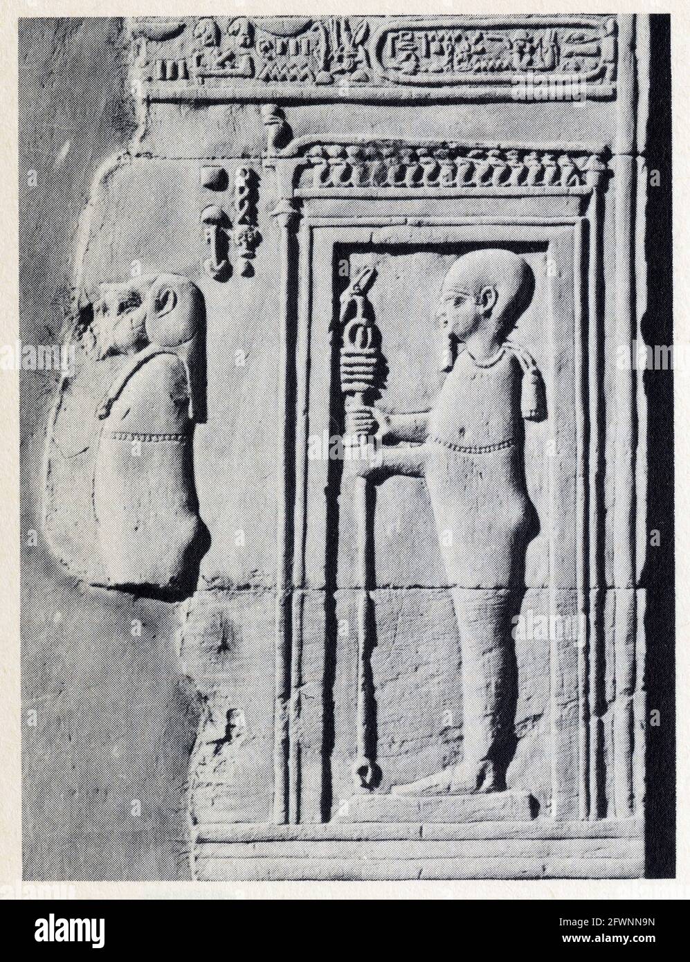 The worker god of Memphis ,Ptah,is generally represented as a stanting ...