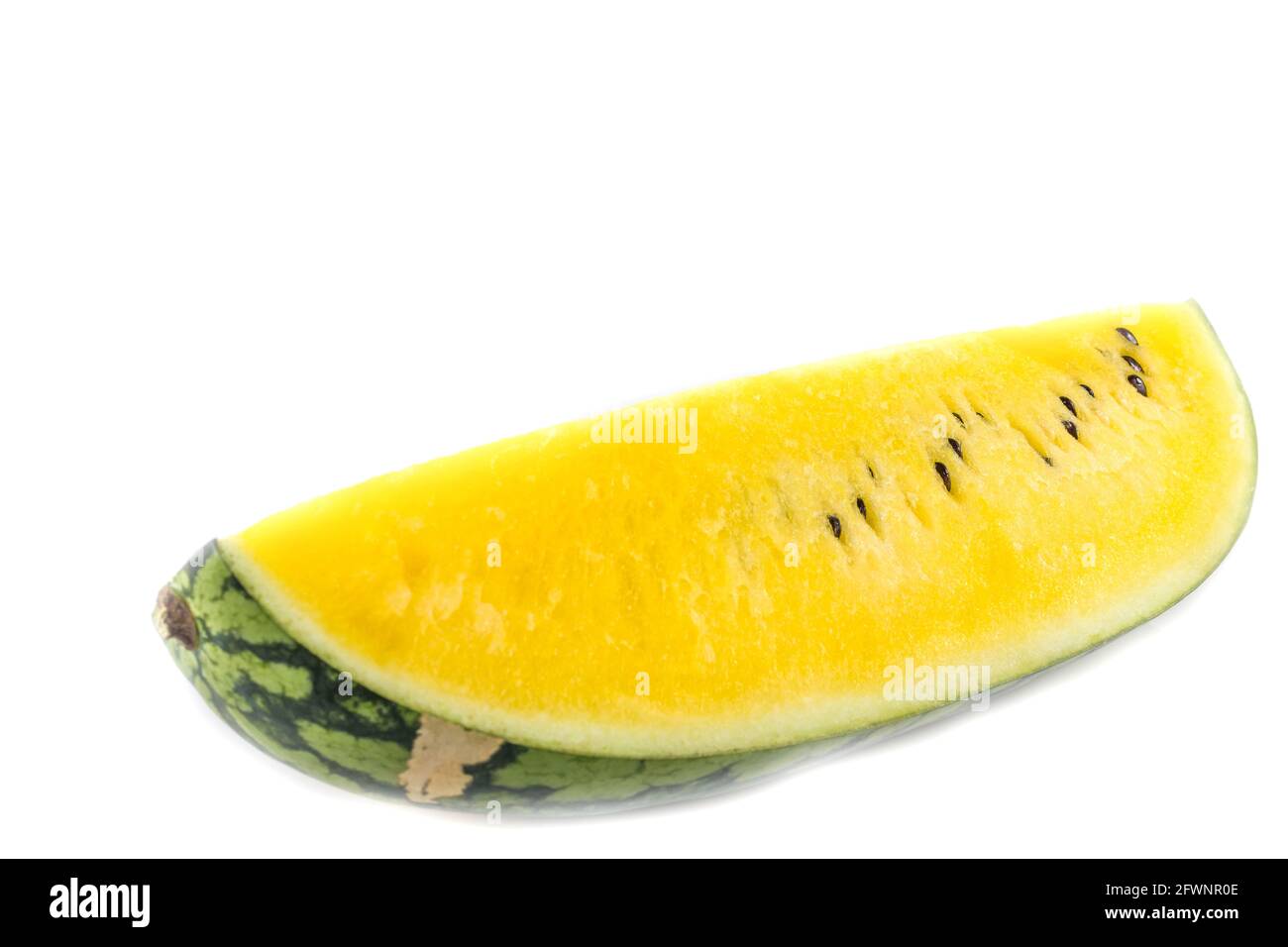 Yellow juicy watermelon slice on white background Stock Photo - Alamy