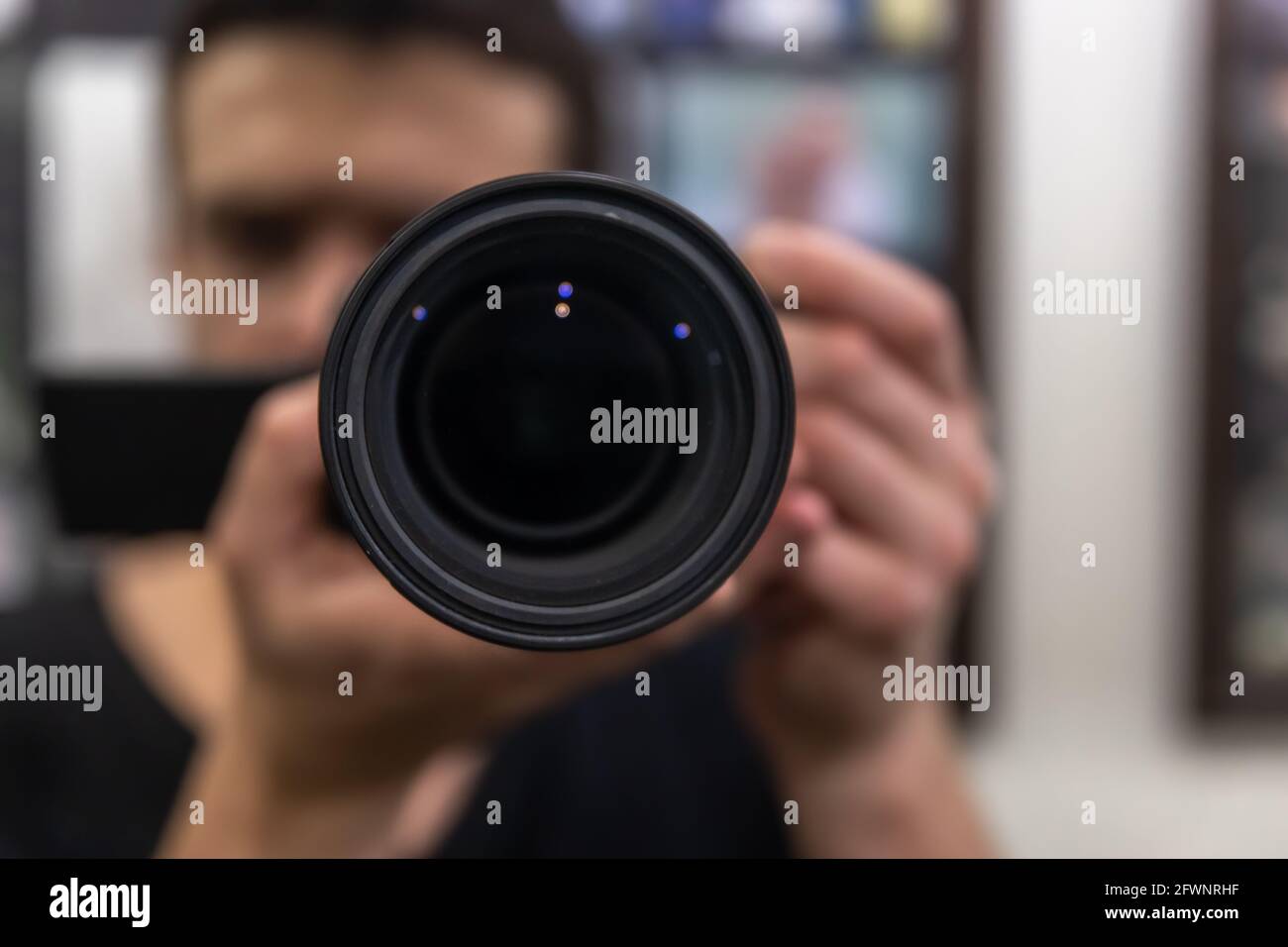 The lens is in the hands of the photographer at the moment of shooting ...